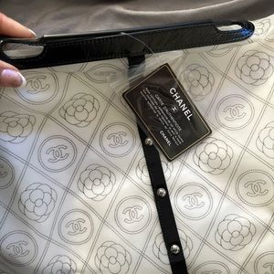 CHANEL | Bags | Rare Chanel Handbag Raincoat Cc Camellia Rain Cover ...